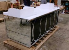 An example of a Laser Cut Mirrored Acrylic Display Counter